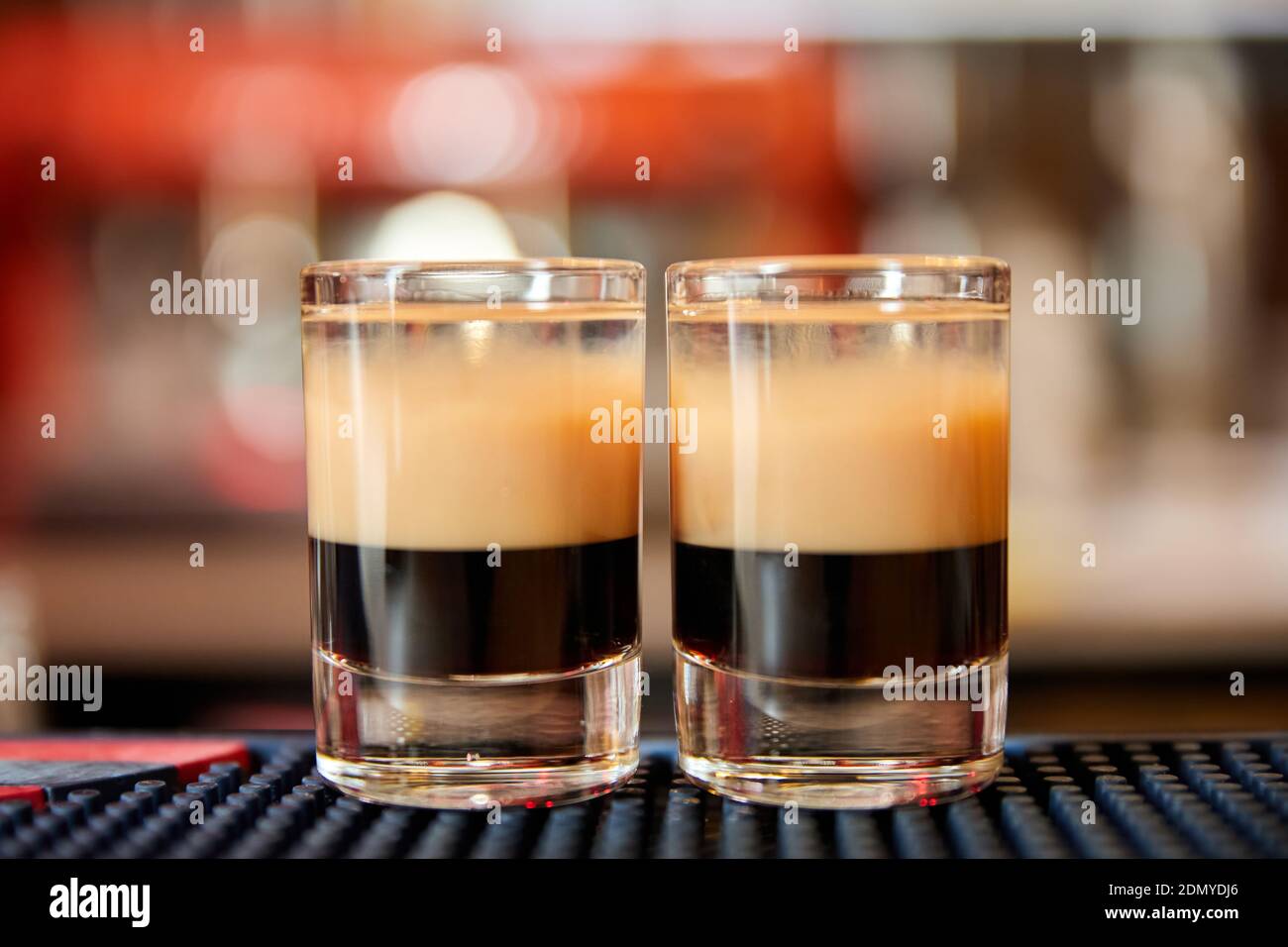 Multicolored alcoholic drinks shots on the bar counter Stock Photo - Alamy