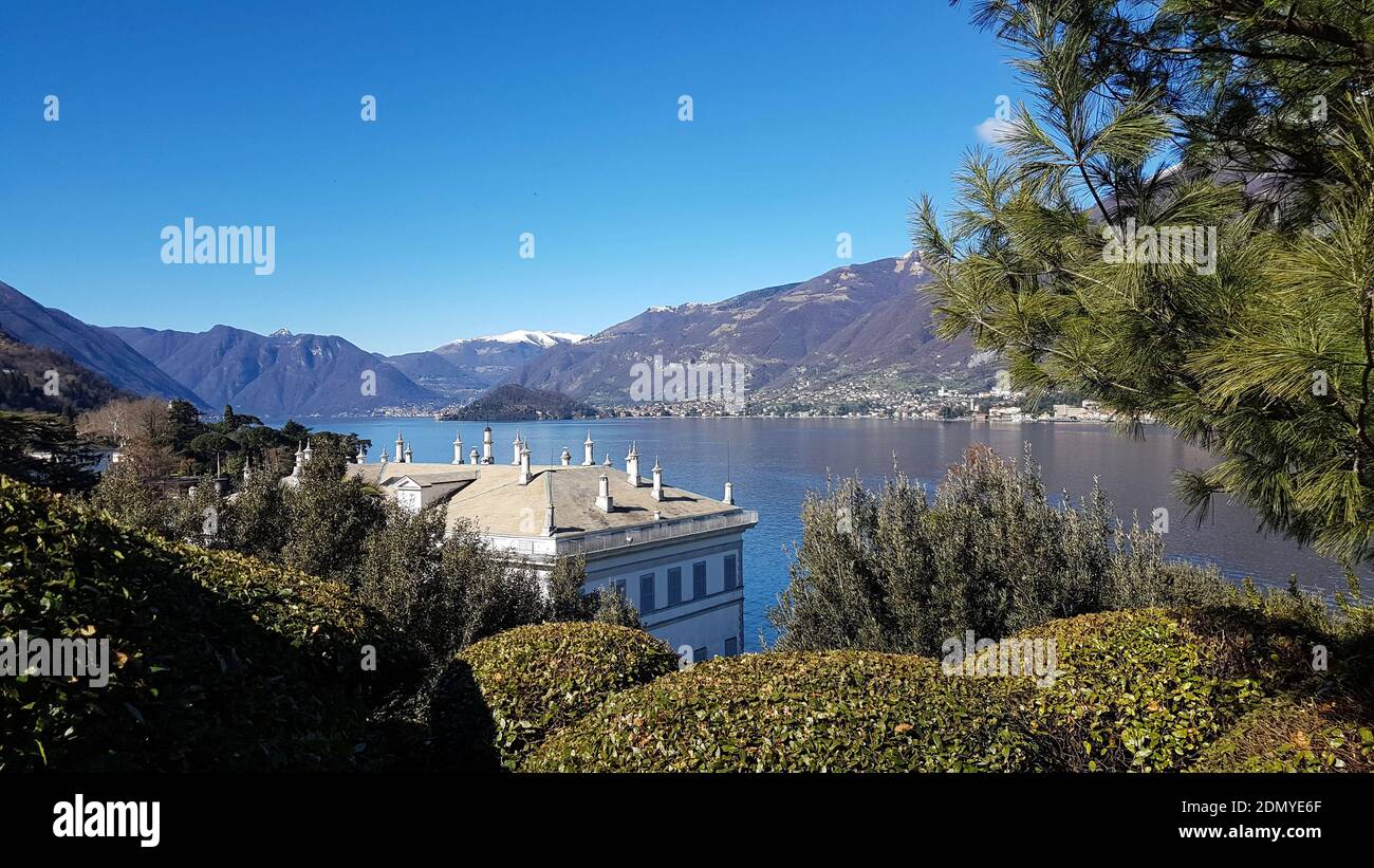 A charming building in front of the quiet lake of Como in Italy Stock ...