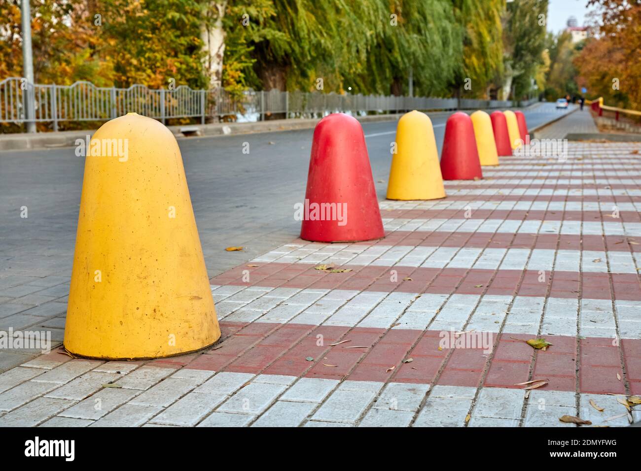 Line of red and yellow concrete traffic cones to detour traffic Stock ...