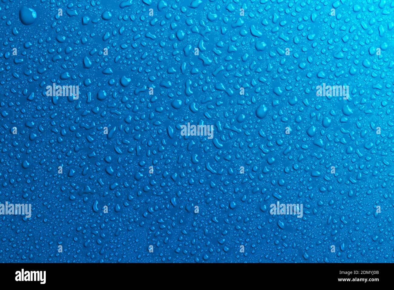 Blue water drops background Stock Photo - Alamy