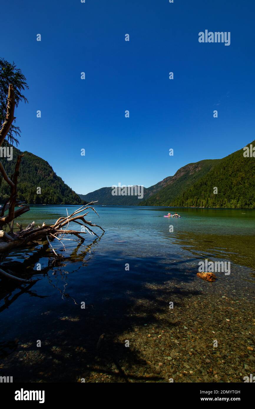 Serene waters of Lake Cameron, Vancouver Island, BC. Stunning scenery ...