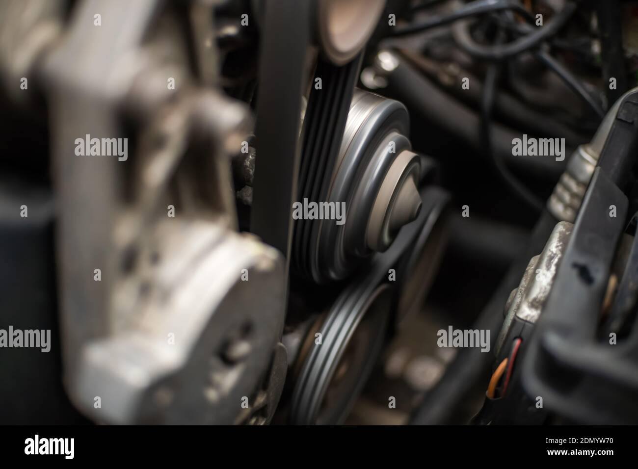 AC generator for a car close-up, the engine compartment of a passenger ...