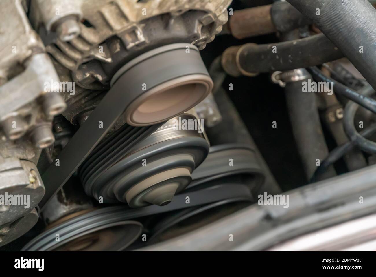 AC generator for a car close-up, the engine compartment of a passenger ...