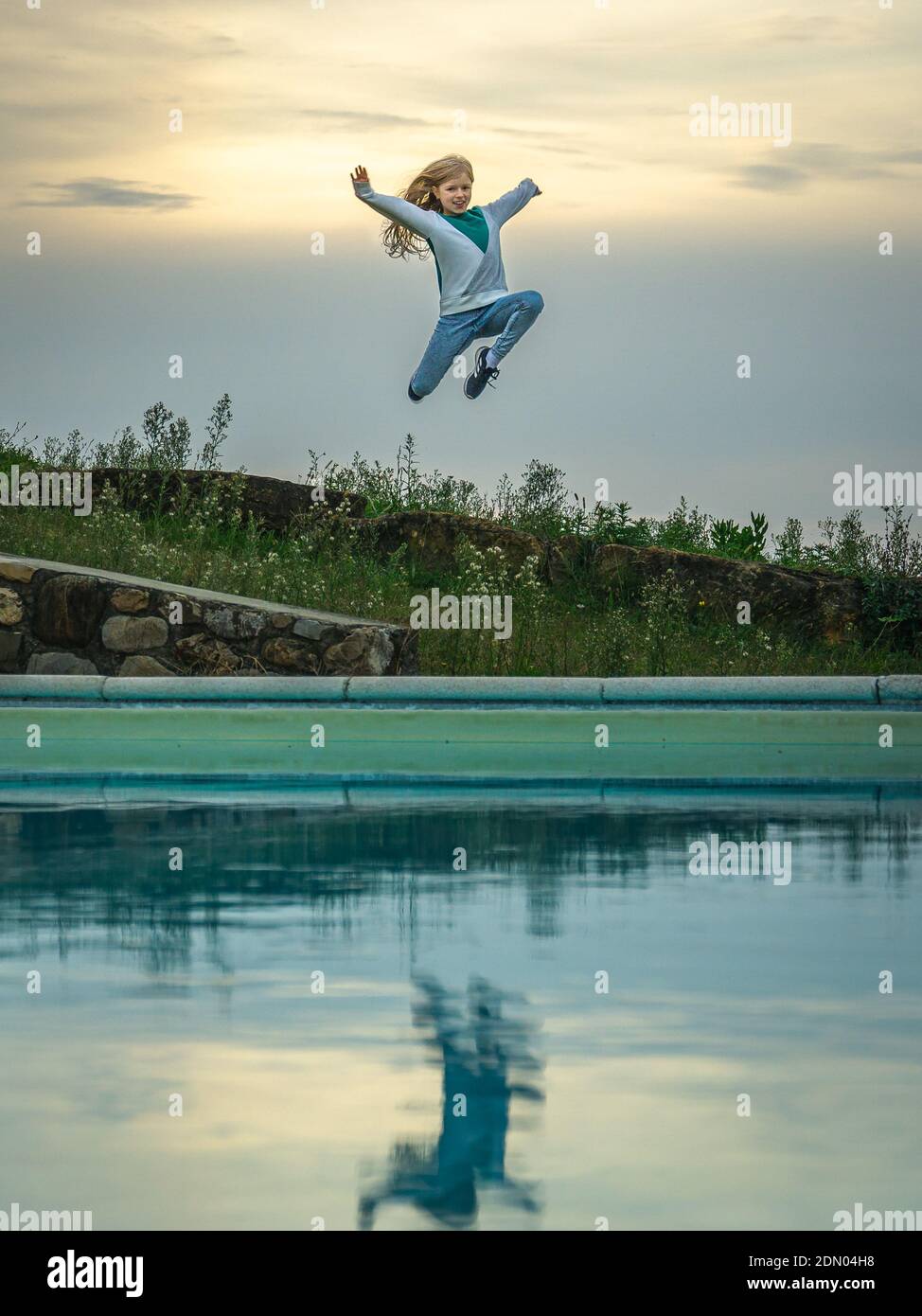 Jumping into pool with clothes hi-res stock photography and images - Alamy