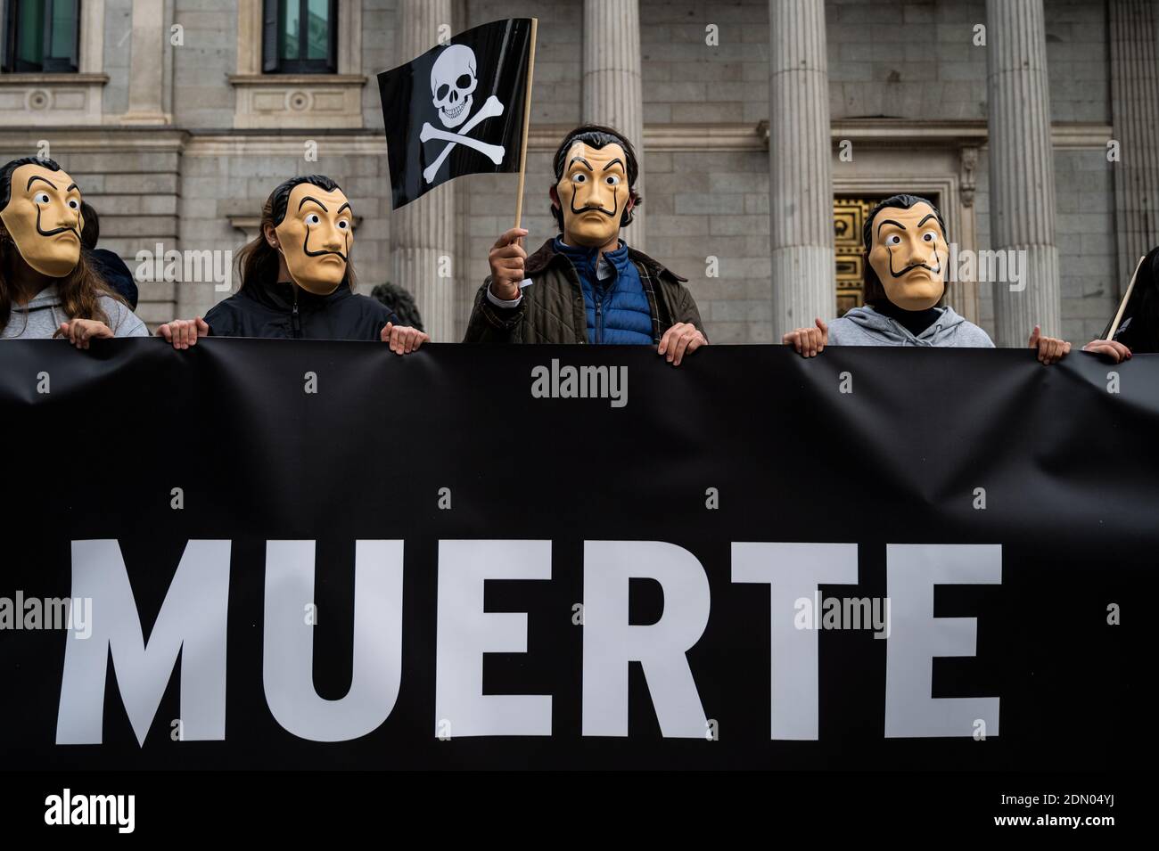 Madrid, Spain. 17th Dec, 2020. Protesters wearing face masks of Dali ...