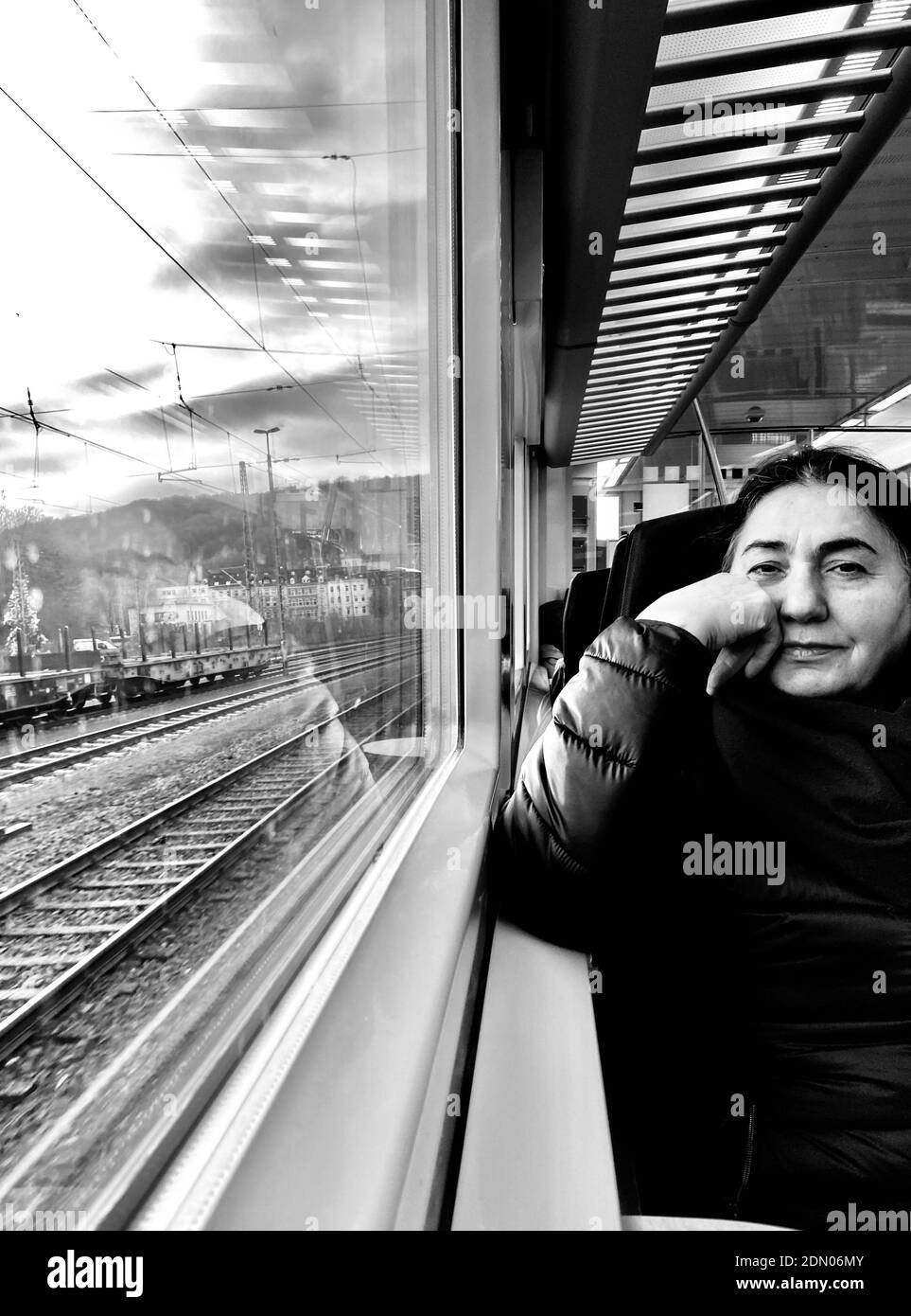 Woman train view window Black and White Stock Photos & Images - Alamy