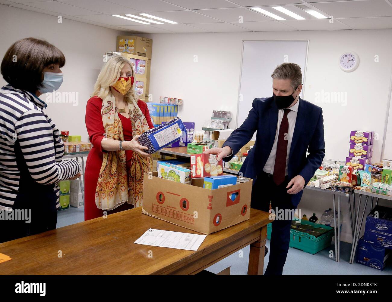 Labour Party Leader Sir Keir Starmer, with Tracy Brabin, packs food ...