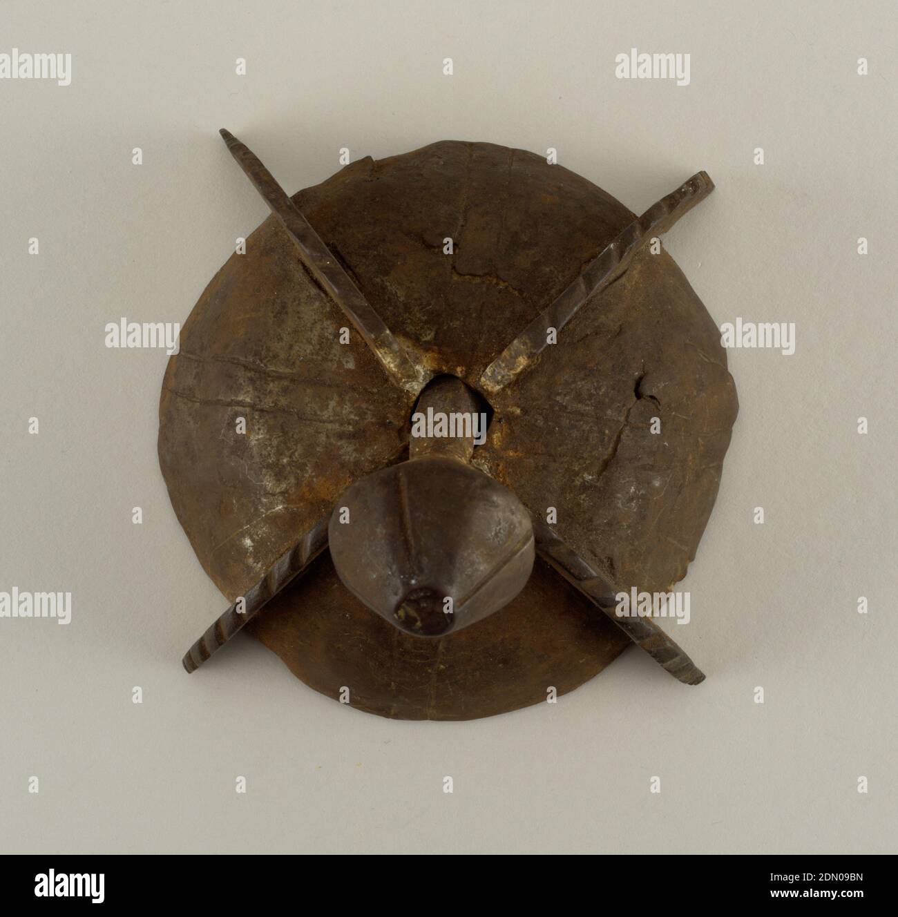 Decorative door boss and nail, Wrought iron, Hemispherical boss divided ...