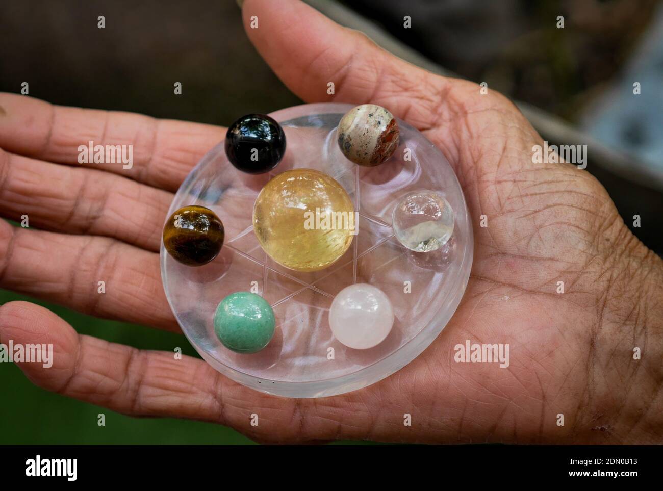 Hands Holding Marbles High Resolution Stock Photography and Images - Alamy