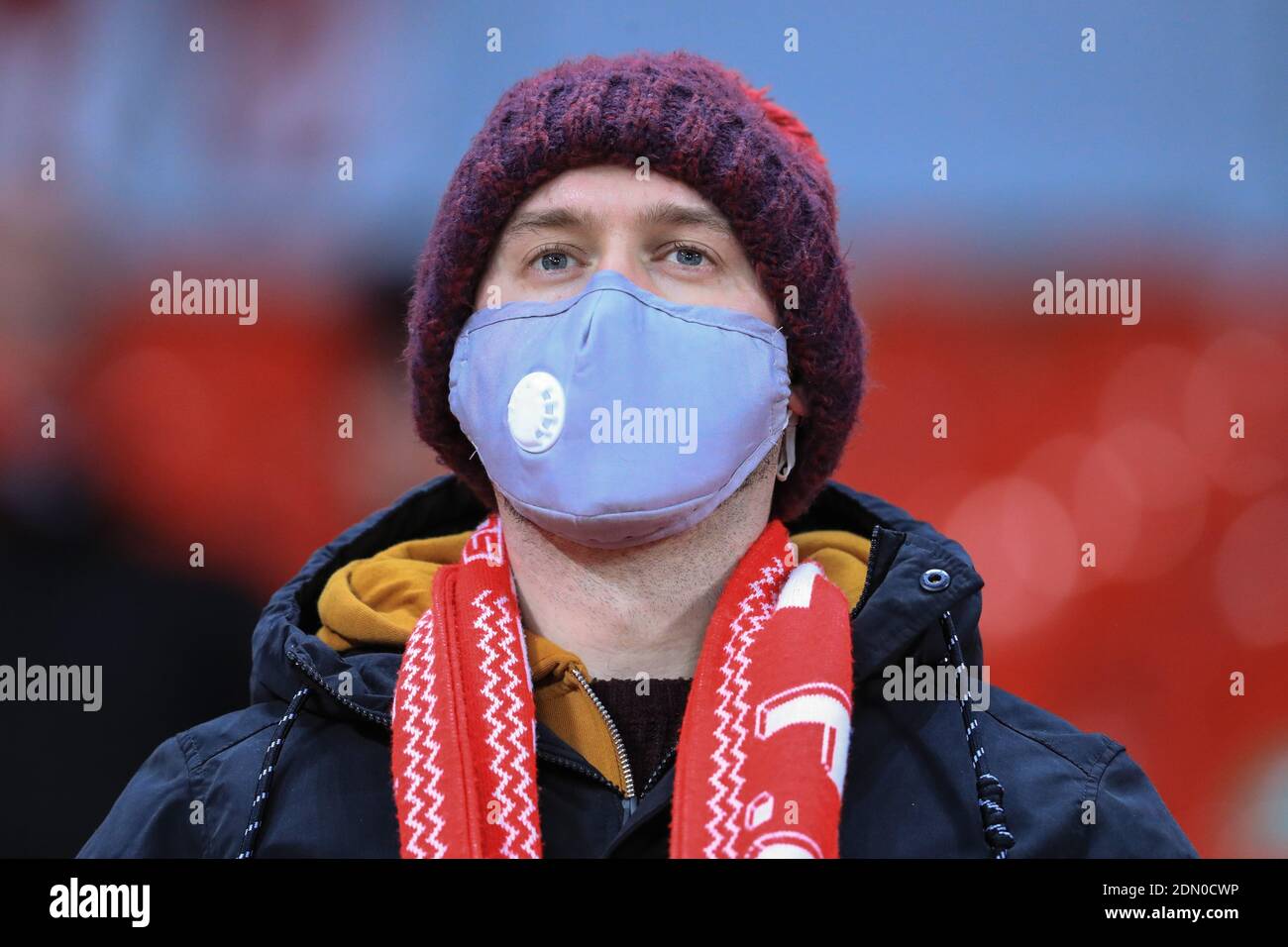 A Liverpool fan returns to the Cop end of Anfield as fans return to ...