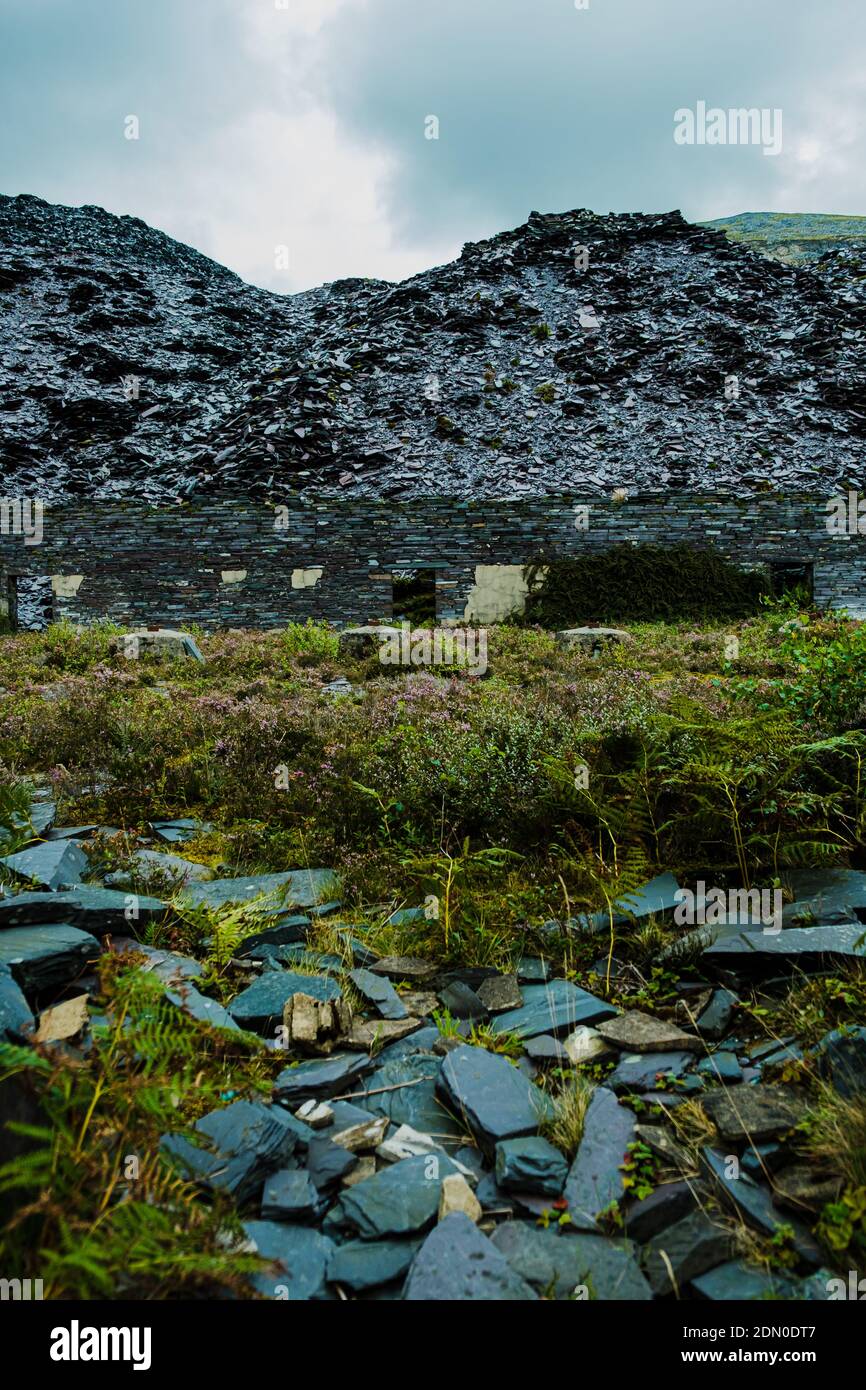 A vertical shot of a huge pile of broken rock fragments Stock Photo - Alamy