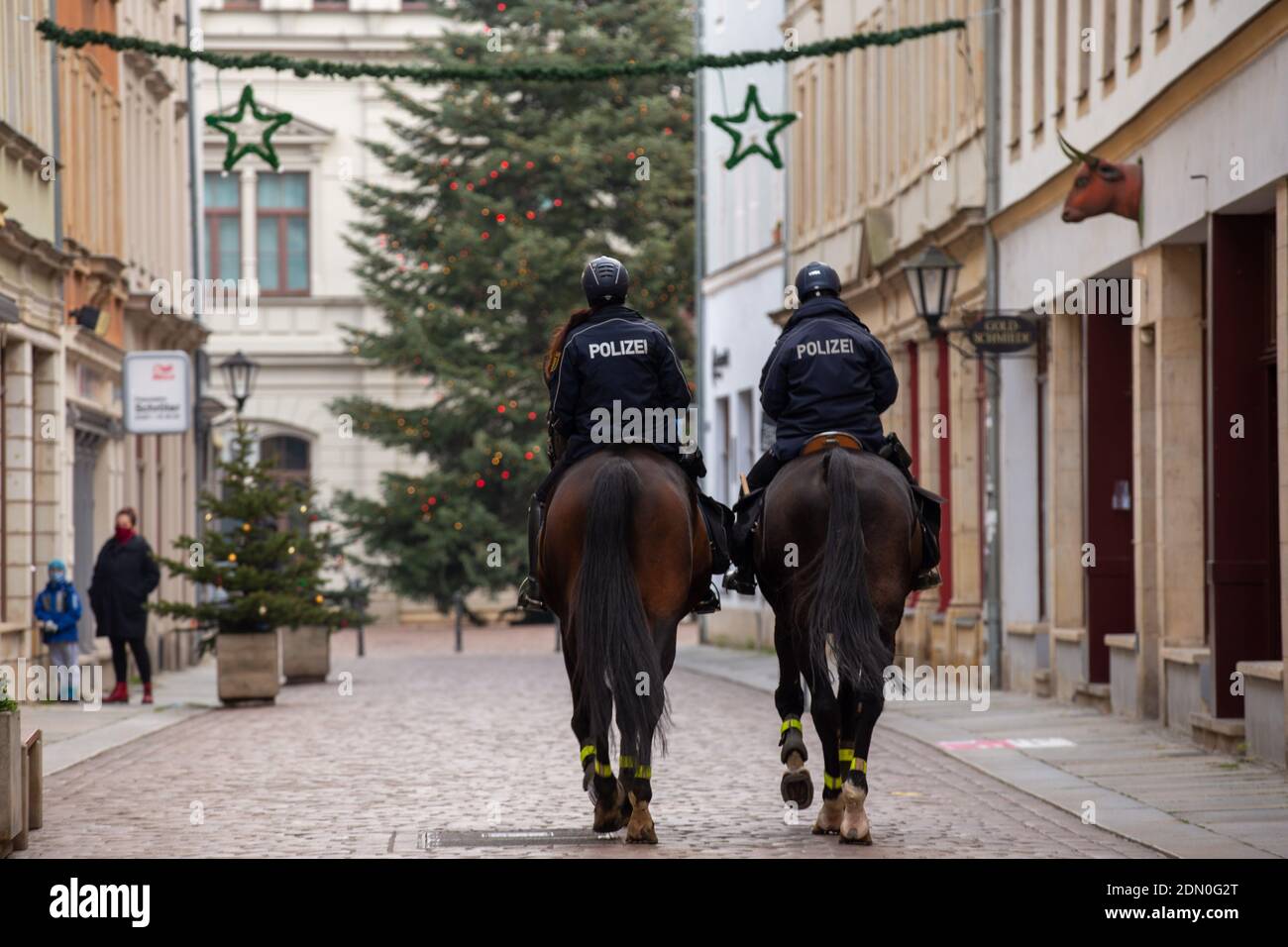 Pirna, Germany. 17th Dec, 2020. Two female police officers from the ...