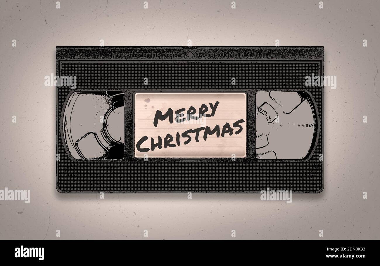 A retro MERRY CHRISTMAS old and distressed black VHS video tape ...