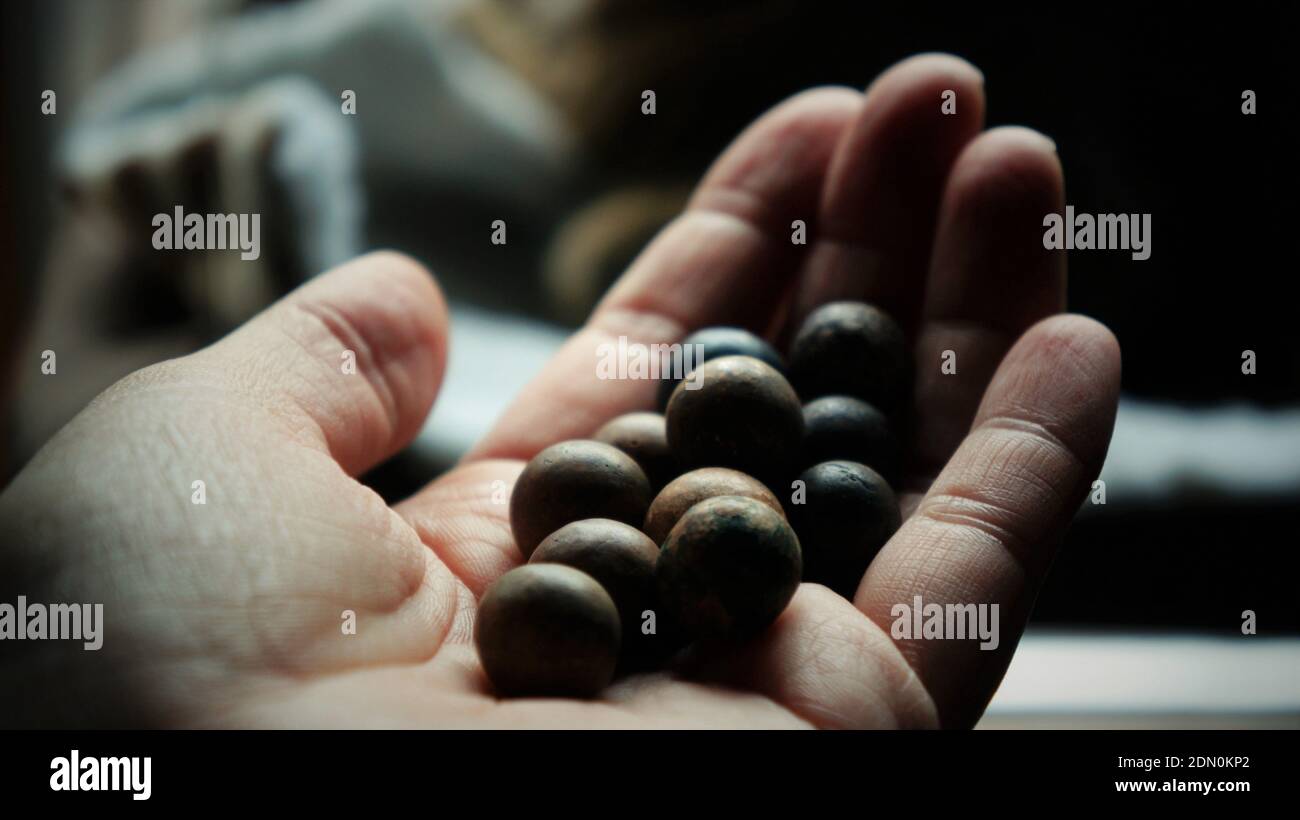Holding marbles hi-res stock photography and images - Alamy