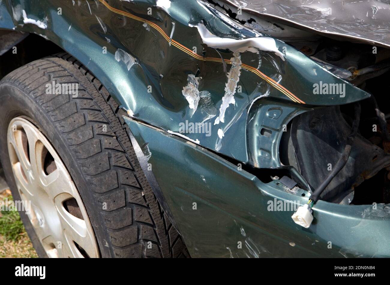 Badly Damaged Green Car Involved in an Automobile Accident Horizontal ...