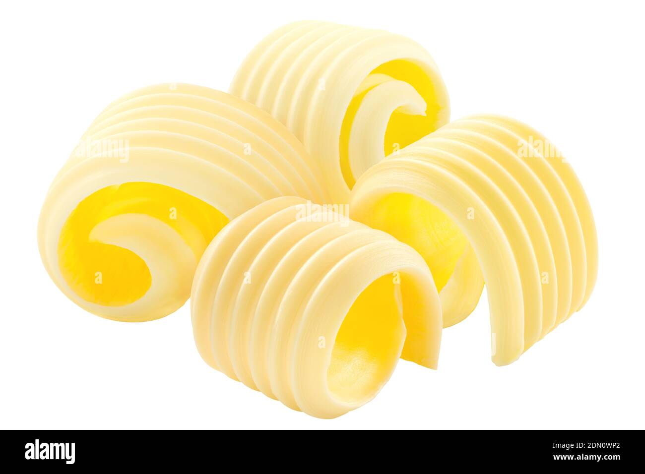 Butter curls rolled up, a group of four, isolated Stock Photo - Alamy