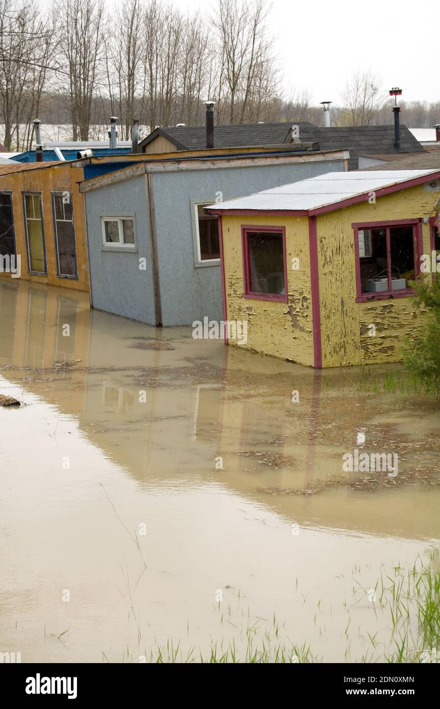 Spring Flood Disaster with Snow Flurries Vertical Stock Photo - Alamy
