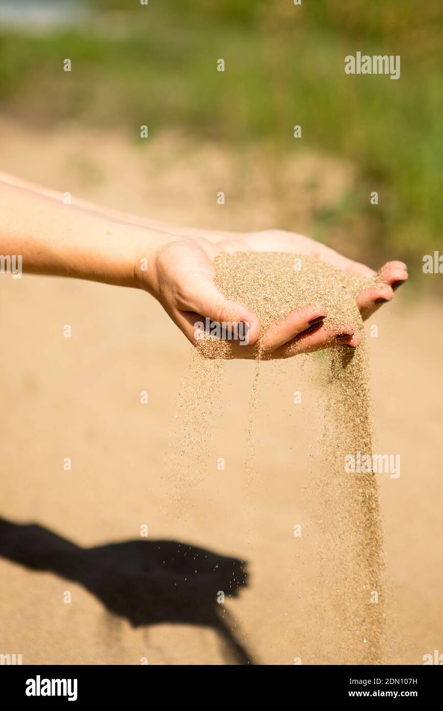 Sand flowing finger hi-res stock photography and images - Alamy