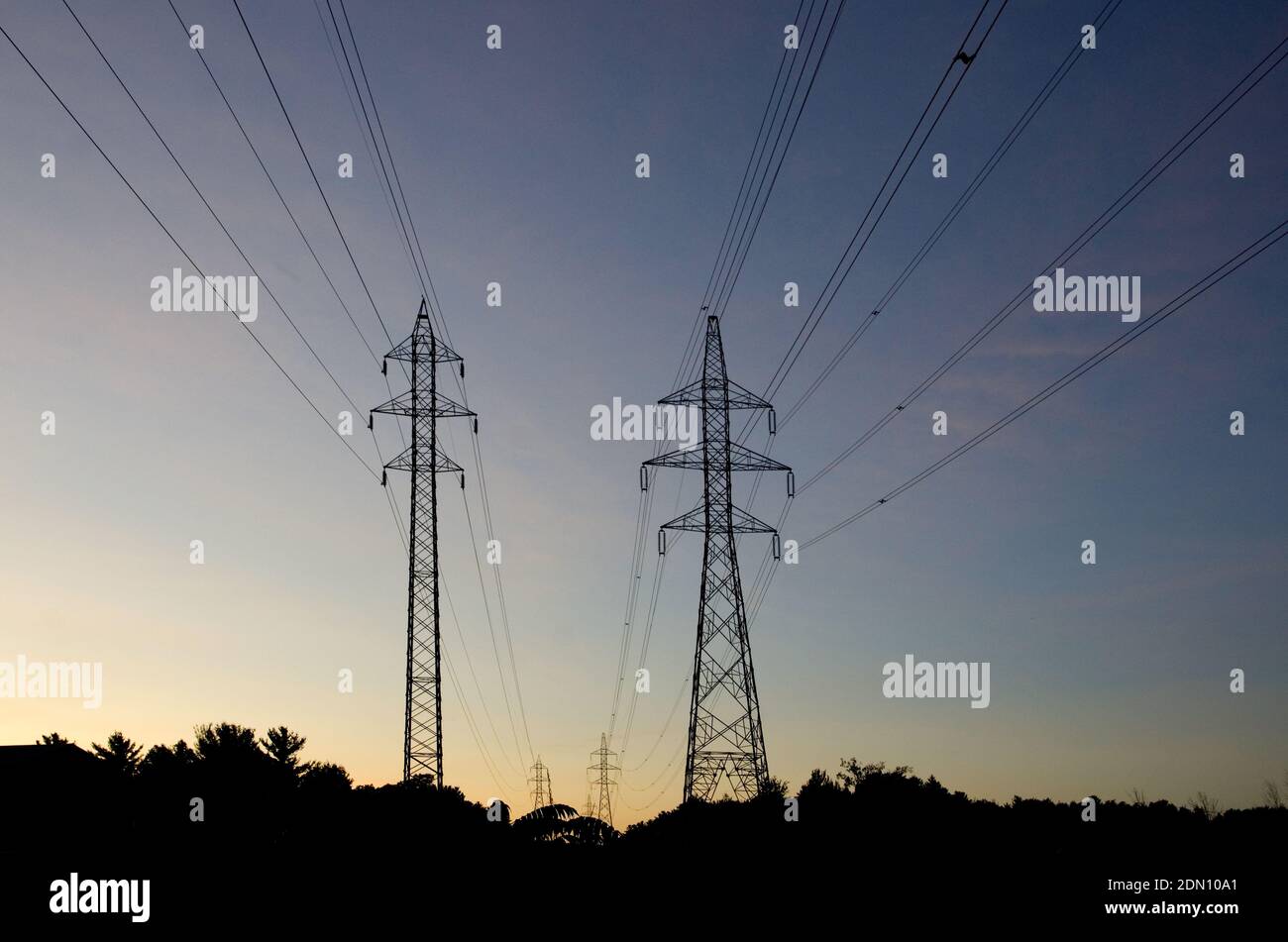 Electrical Hydro Towers and Cables at Sunset Horizontal Stock Photo - Alamy