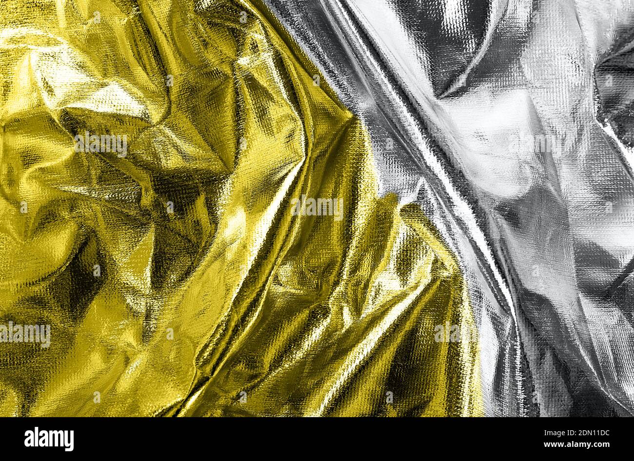 Shiny crumpled surface of trendy yellow and grey foil for textured ...