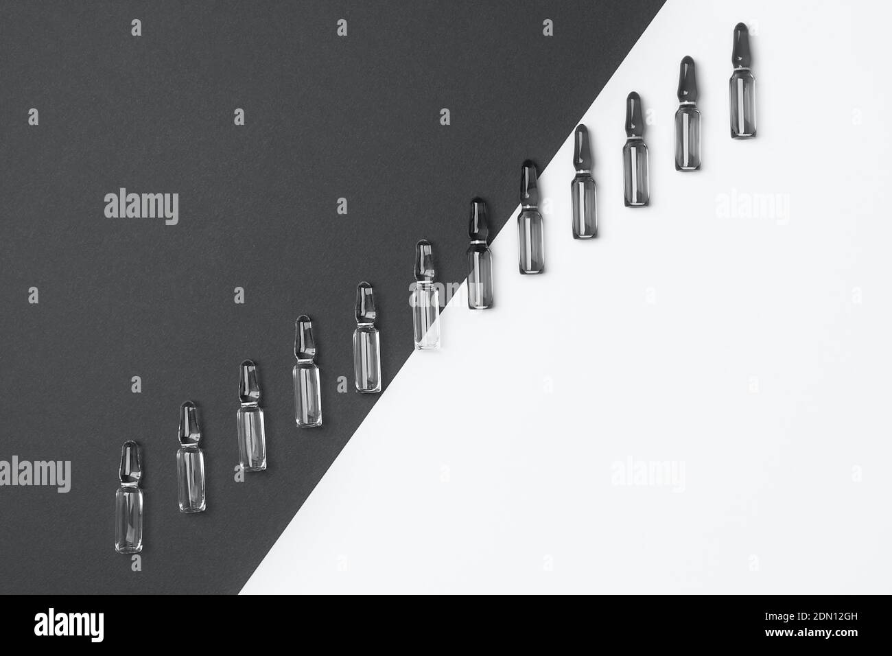 Line of ampules for injections on trendy grey and isolated white ...