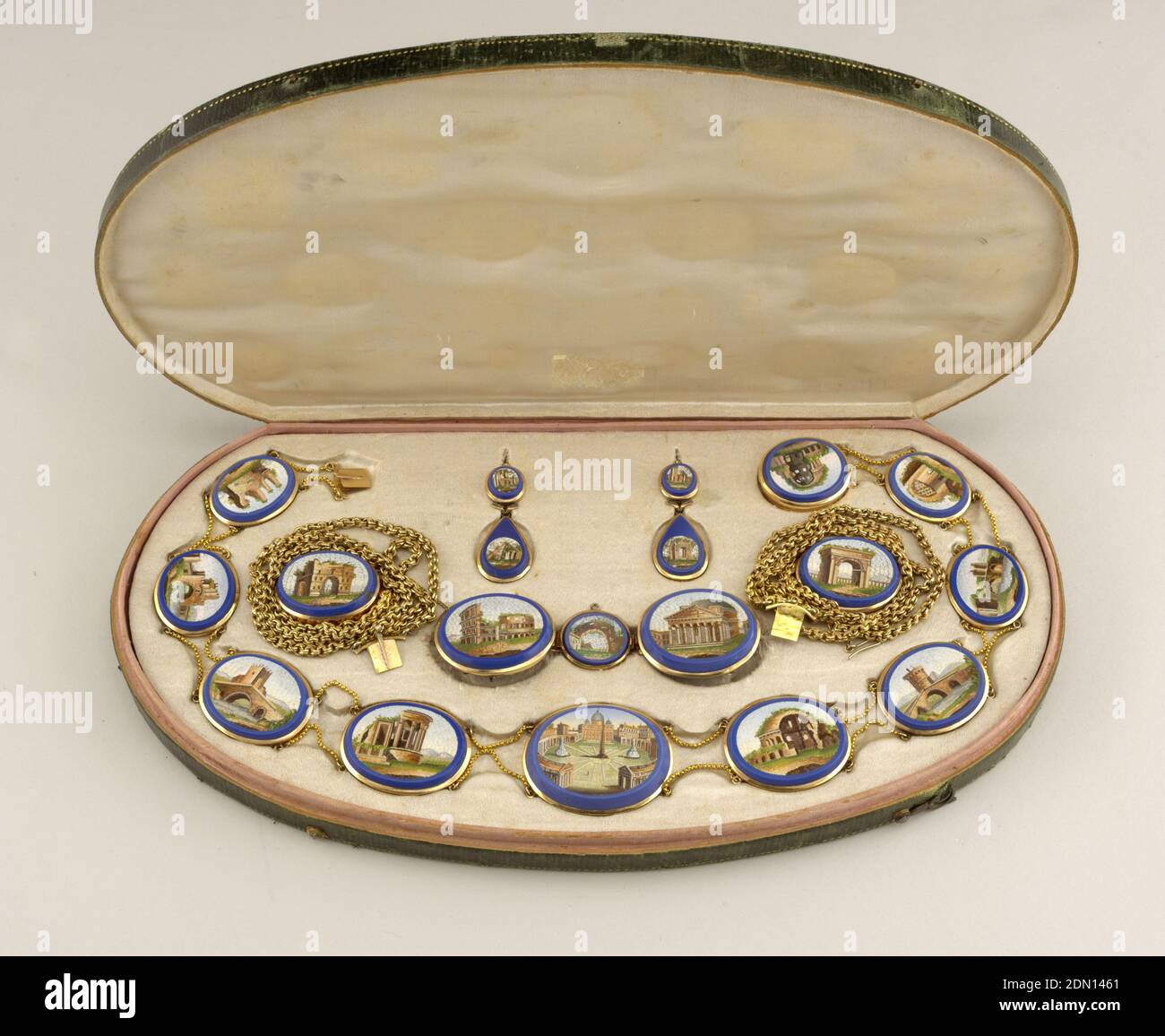 Micro-mosaic, Gold sheet and wire, glass mosaics, A gold oval brooch ...