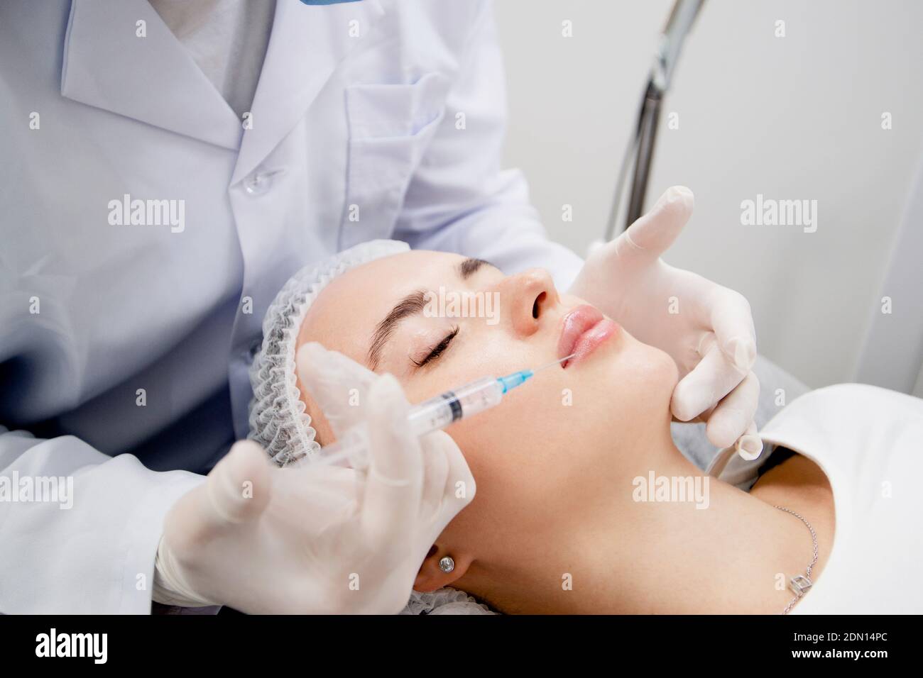 Young woman's getting injections to solve some age-related skin ...