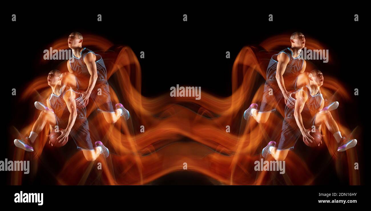 Young purposeful basketball player training in action on black ...