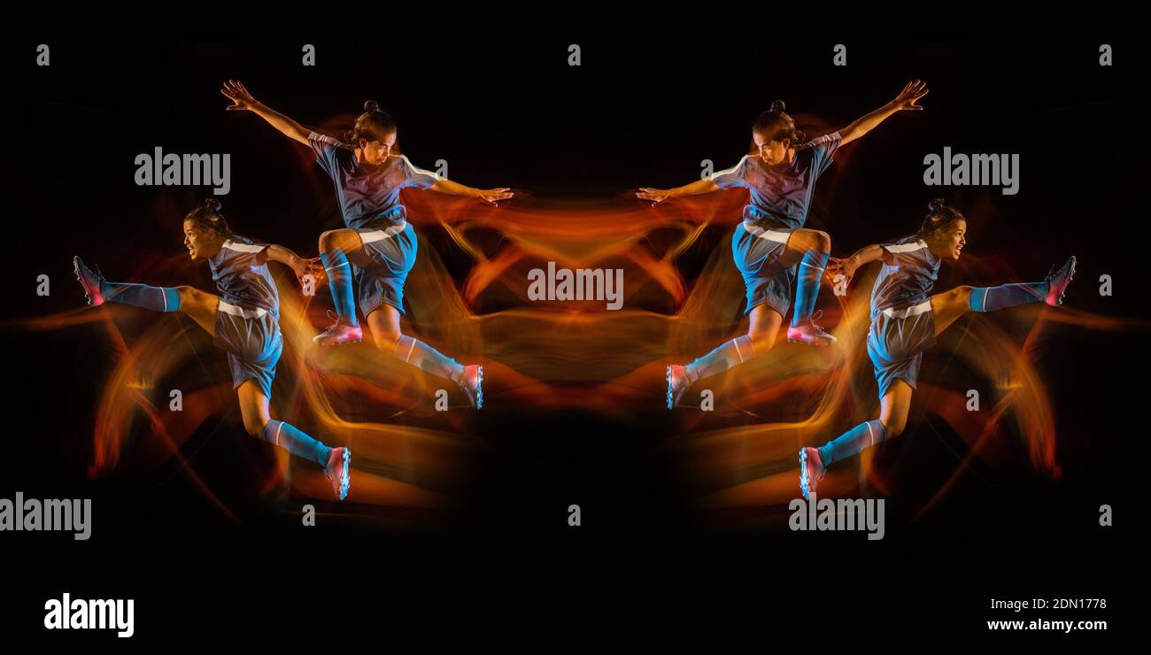 Football or soccer player on black studio background in mixed light ...