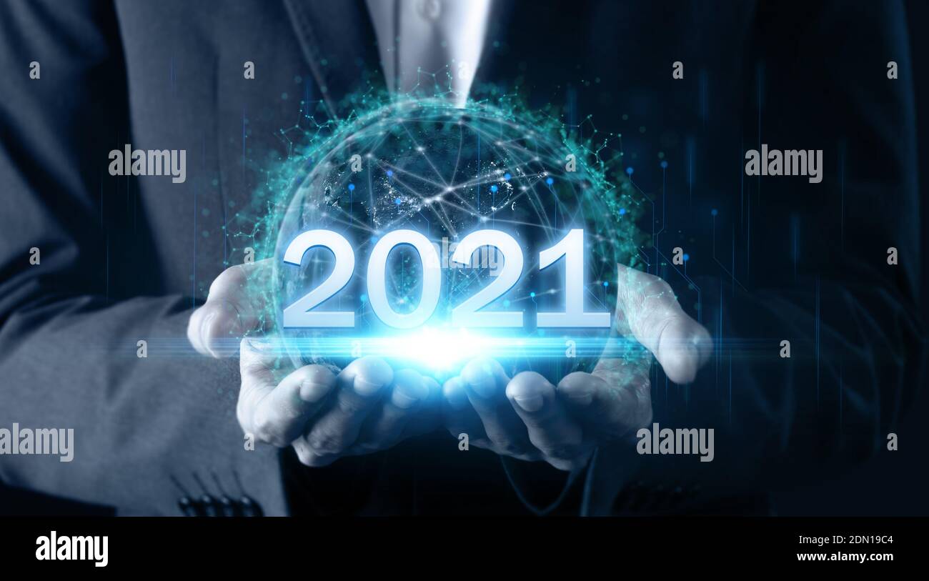 2021 futuristic technology concept man hand holding earth with global ...