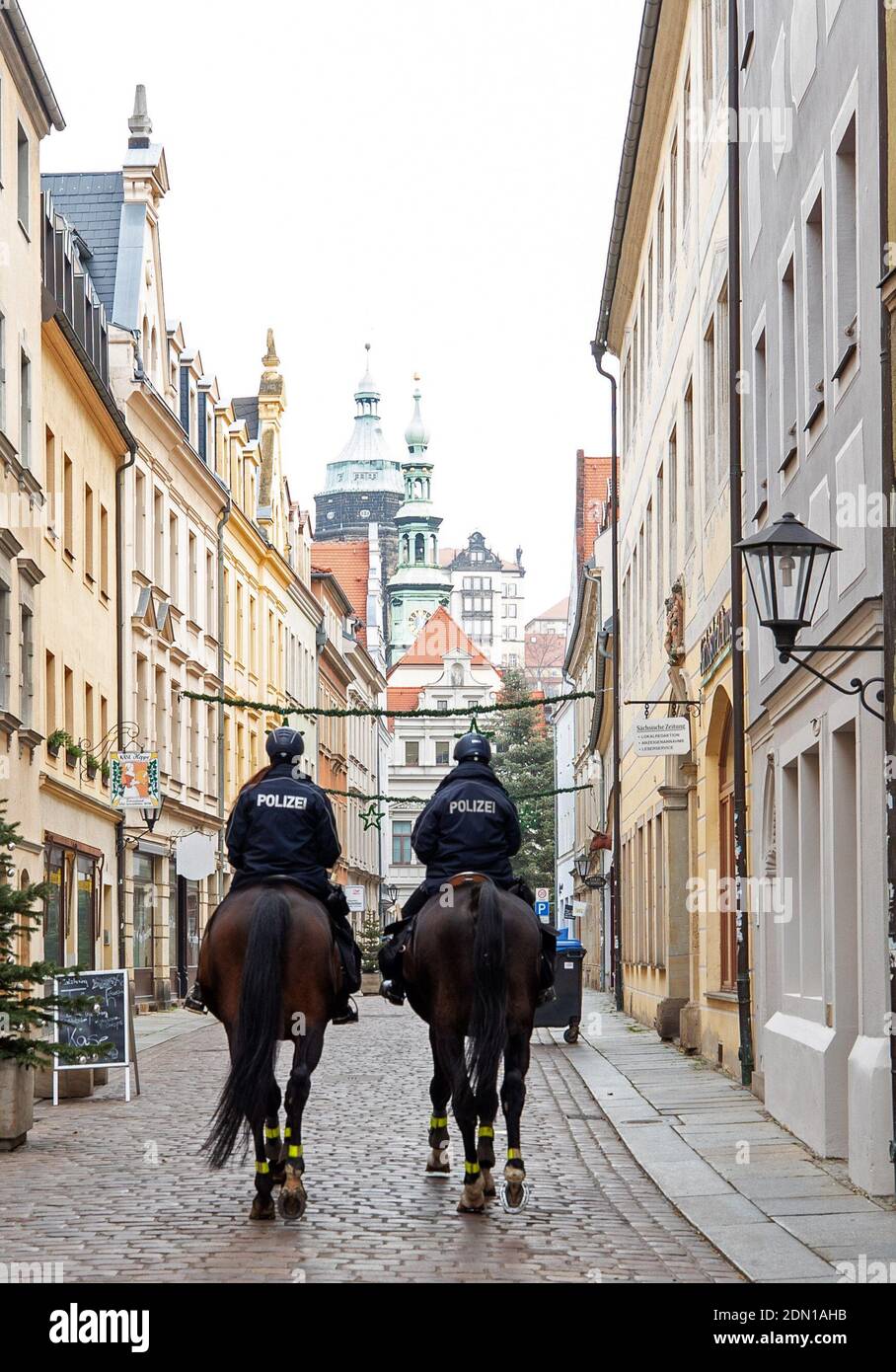 Pirna, Germany. 17th Dec, 2020. Two female police officers from the ...