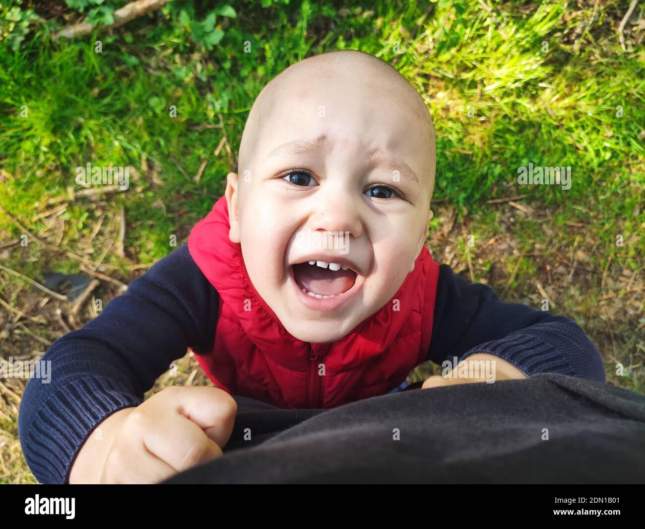 Boy screaming grass hi-res stock photography and images - Alamy