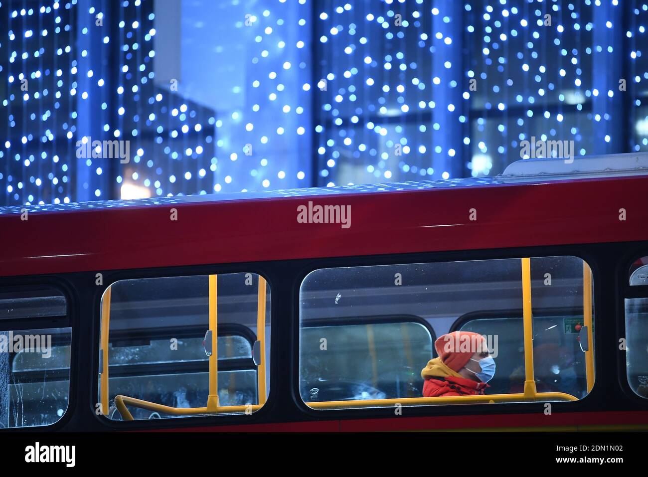 A man on a bus in Oxford Street in London Stock Photo - Alamy