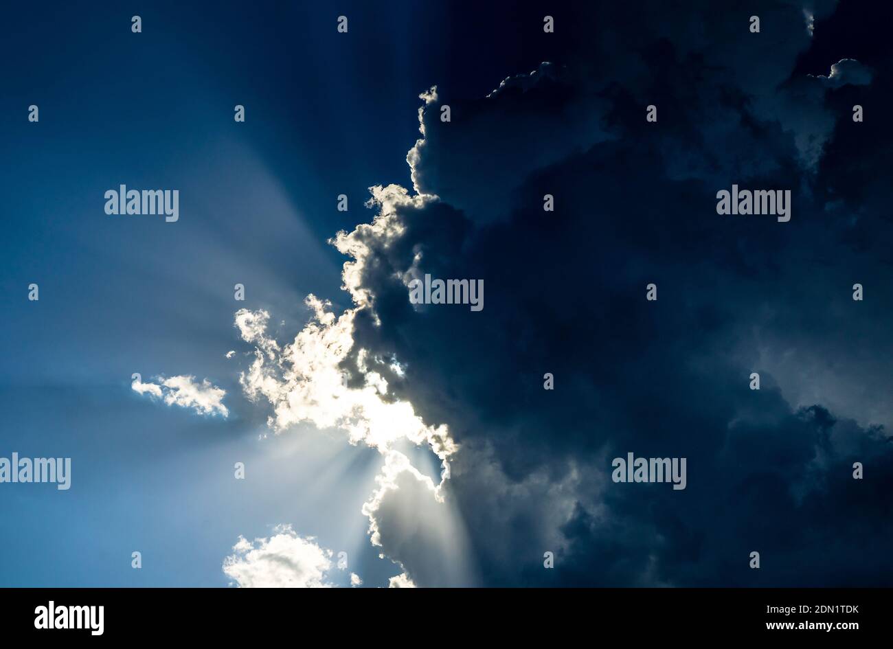 Light rays streaming through clouds hi-res stock photography and images ...