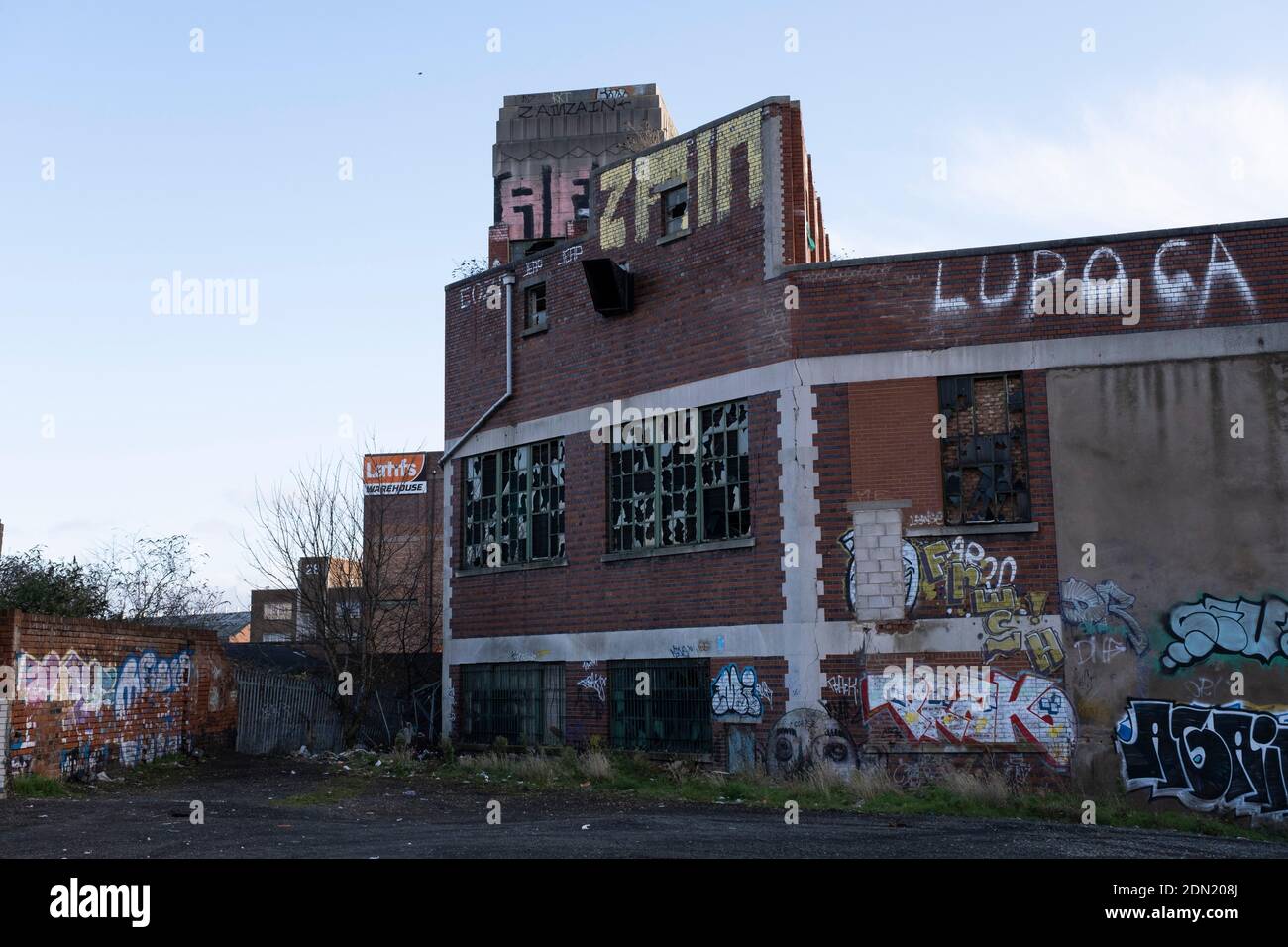 Street art adorns derelict at dilapidated factory buildings in the old ...