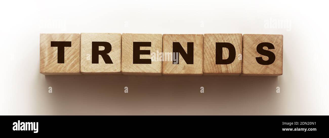 Wooden Blocks with the text trends. Trend word made with building ...