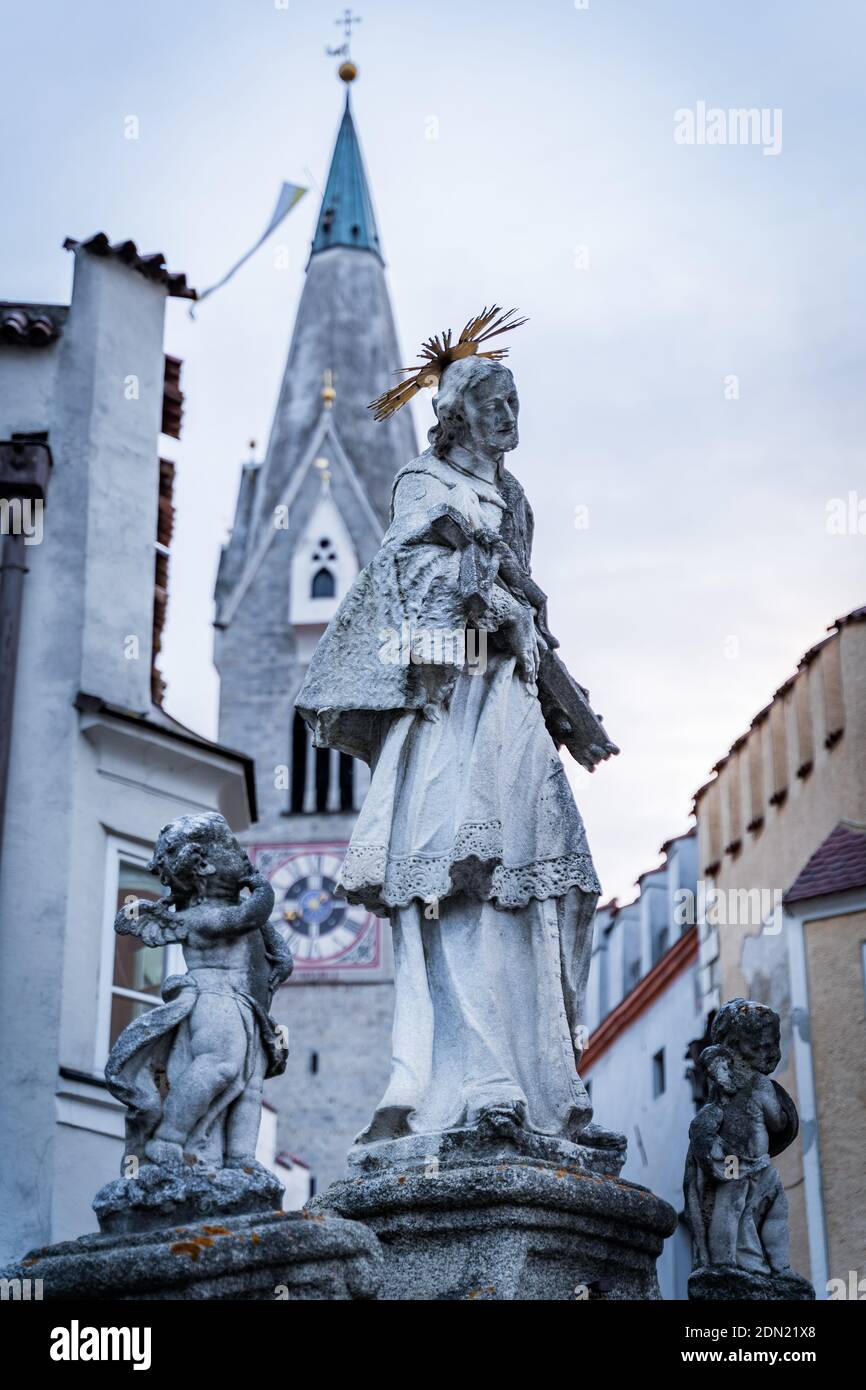 religious statues with church in background Stock Photo - Alamy