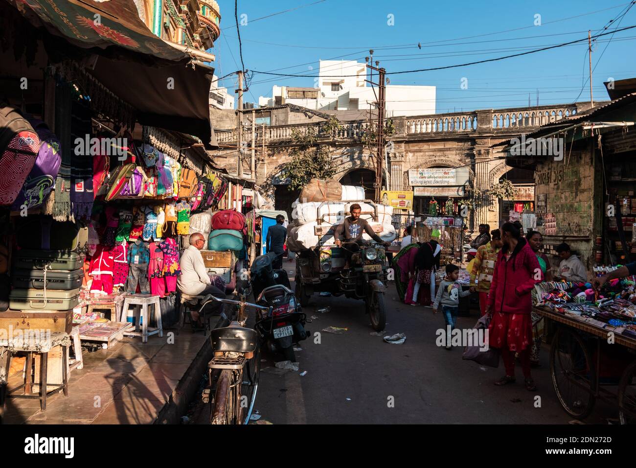 Jamnagar, Gujarat, India - December 2018: A man transporting goods in a ...