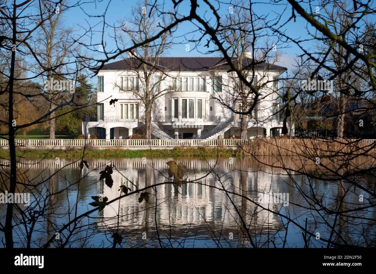 Attractive white house reflected in the River Thames at Cookham ...