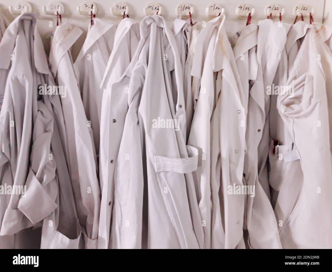 Lab Coats Hanging High Resolution Stock Photography and Images - Alamy
