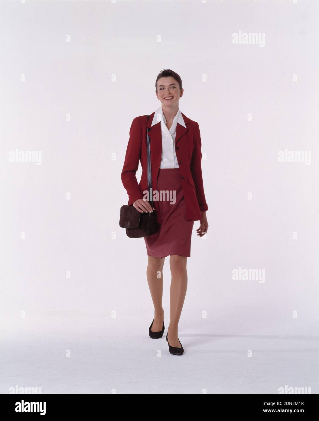 Red suit hi-res stock photography and images - Alamy