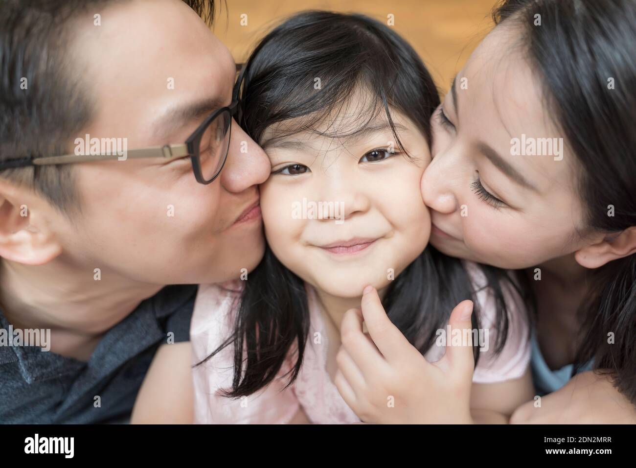 Indian father kissing daughter hi-res stock photography and images - Alamy