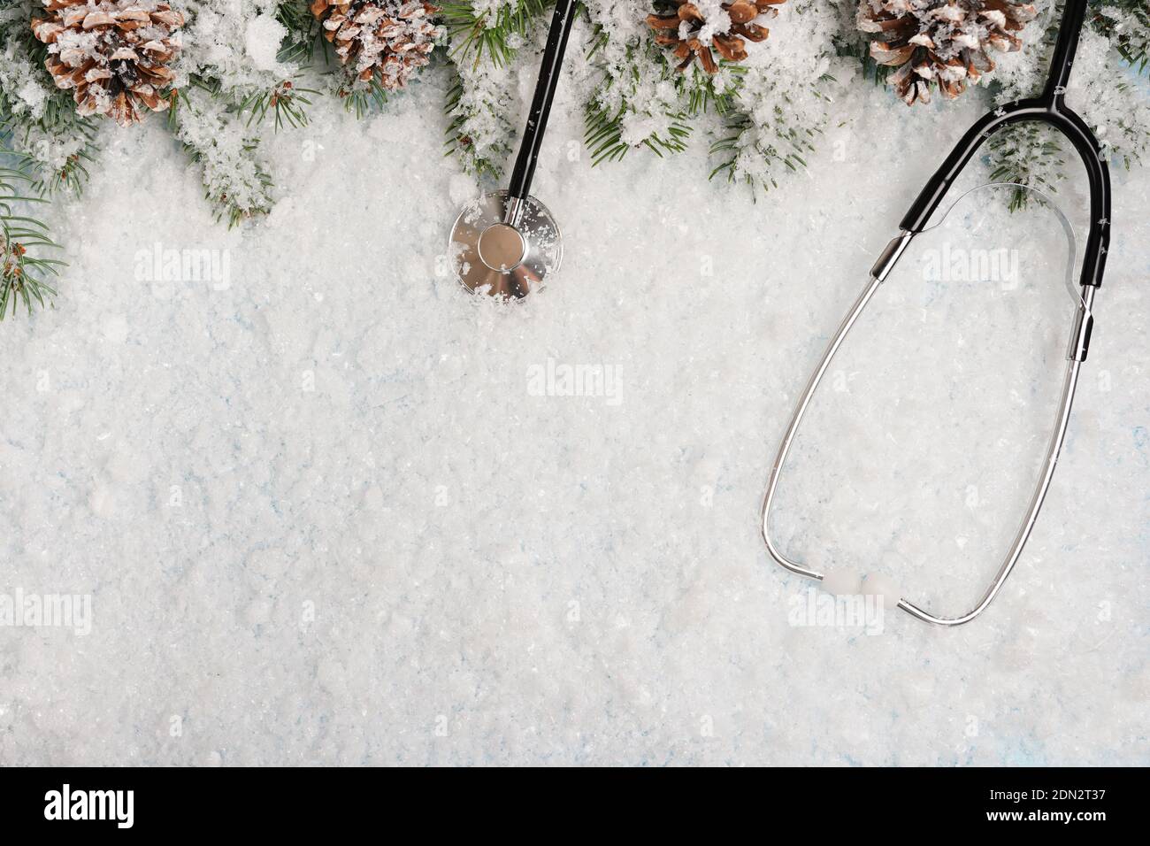 Christmas medicine blue background with stethoscope and snow, medical ...
