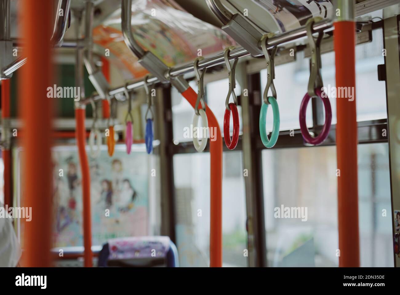Handles Hanging In Bus Stock Photo - Alamy