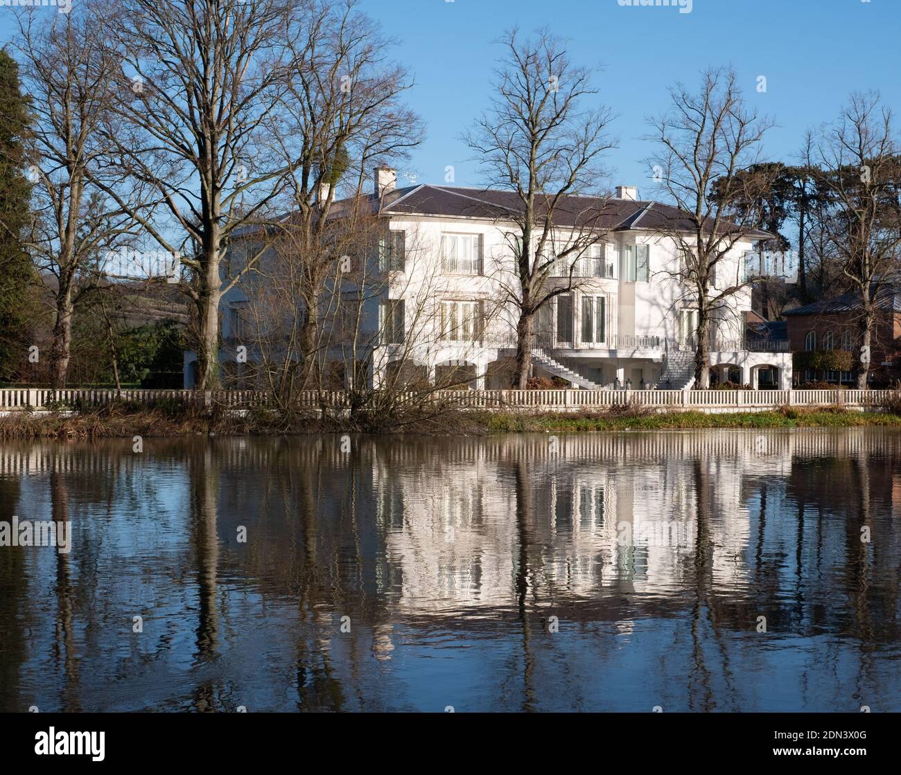 Attractive white house reflected in the River Thames at Cookham ...