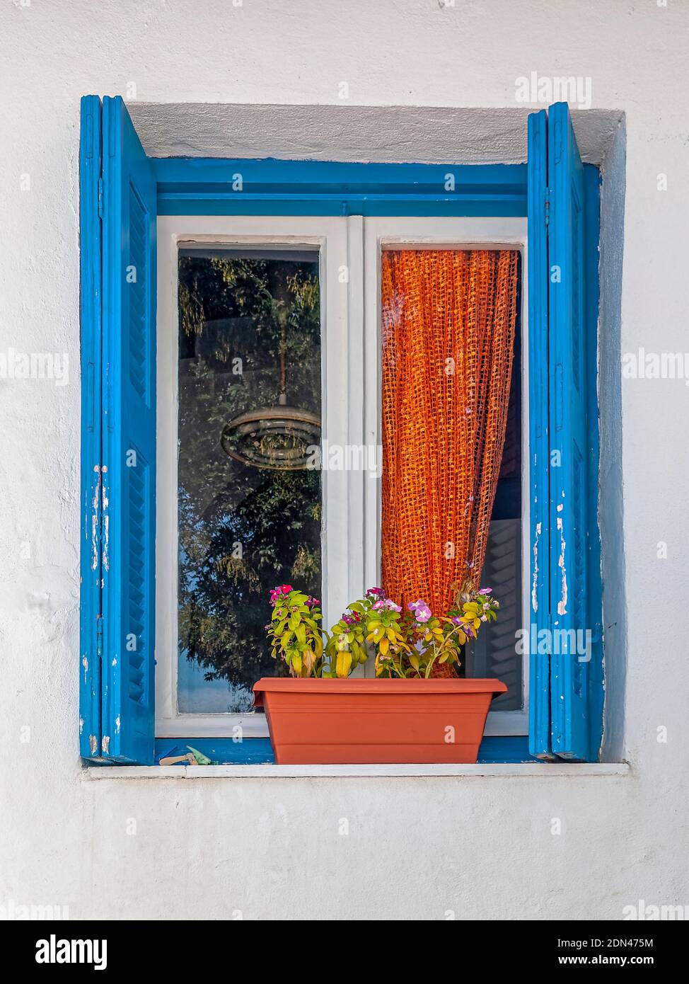 Colorful Frame. A "classic" Mediterranean house window painted in ...