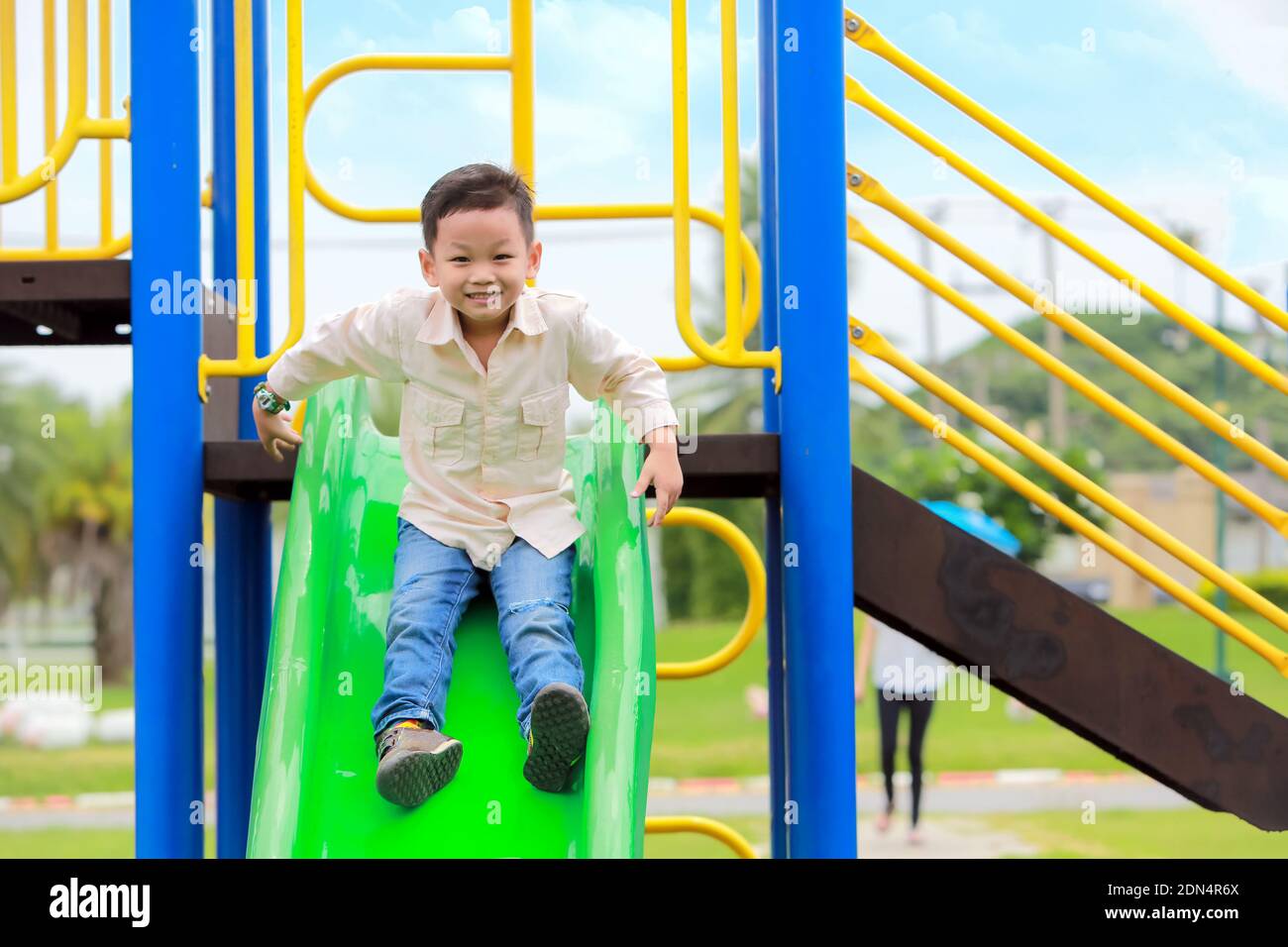 Asian boy sliding hi-res stock photography and images - Alamy