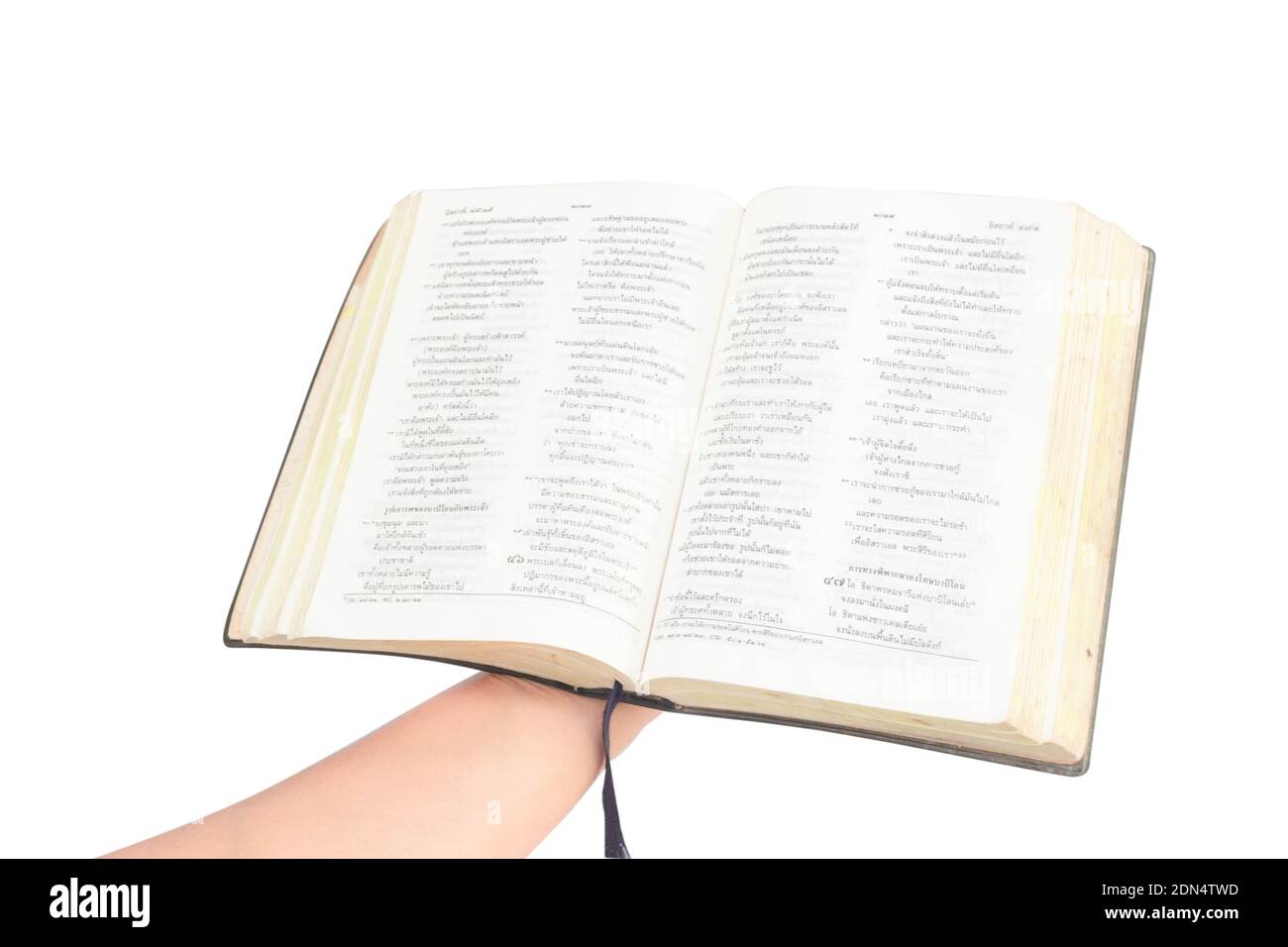 Praying hand with bible Cut Out Stock Images & Pictures - Alamy