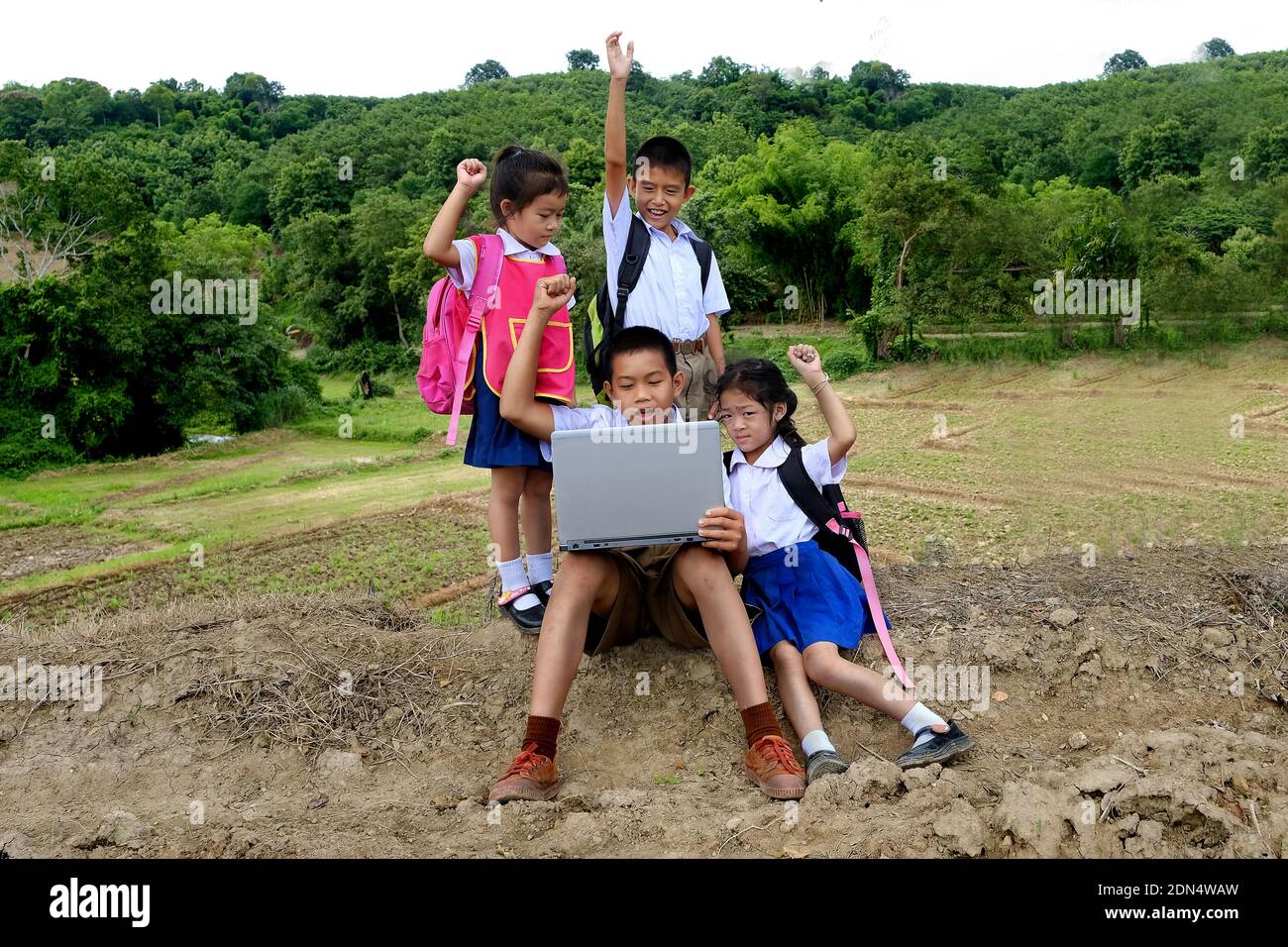 Brother sister computer uniform hi-res stock photography and images - Alamy