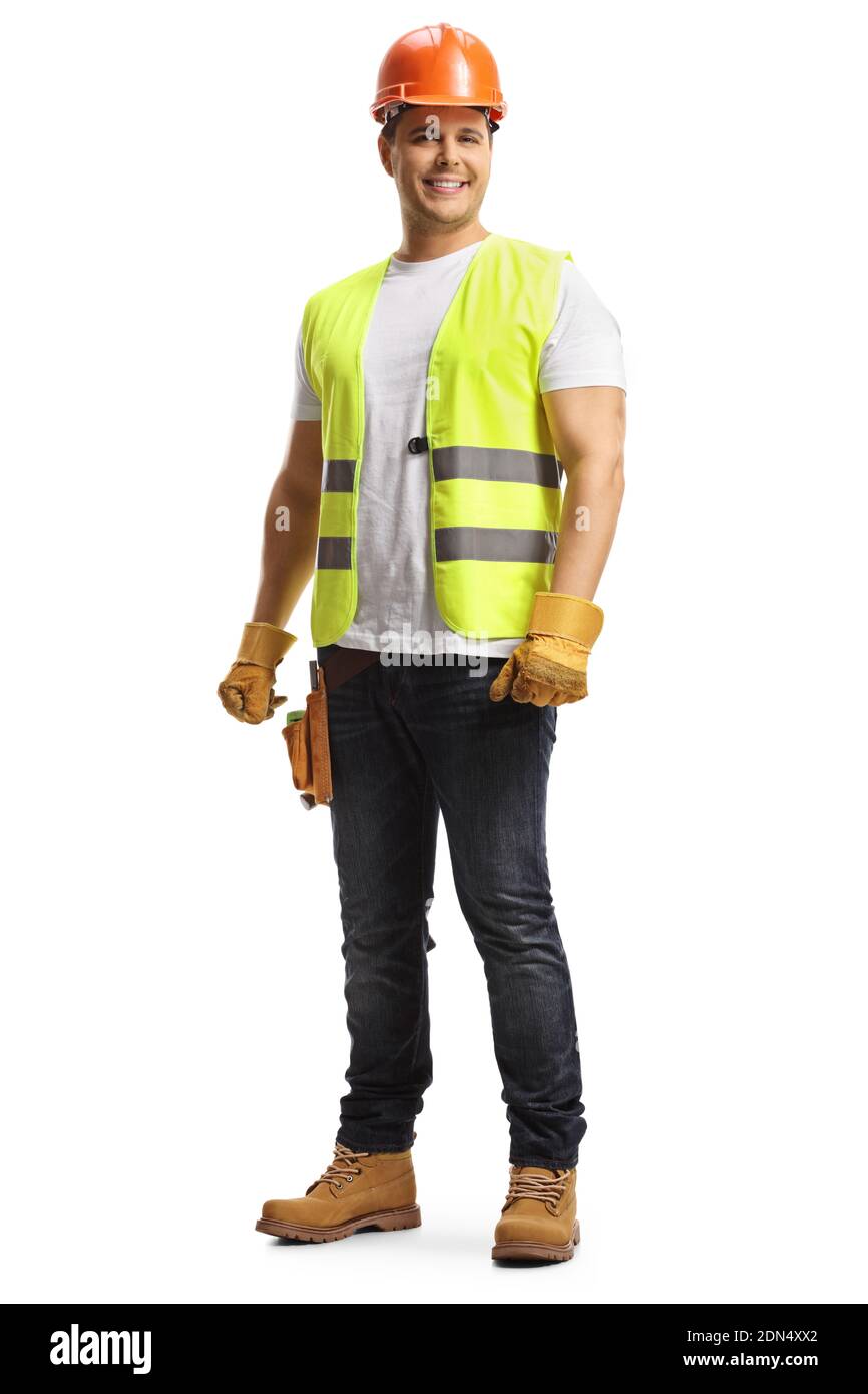Full length portrait of a smiling young construction worker with a ...